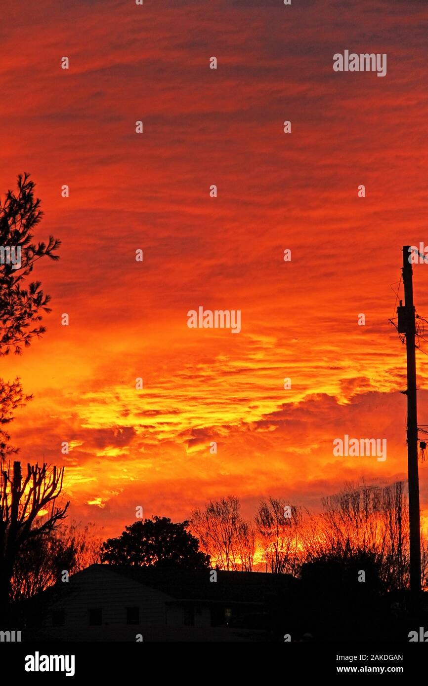 Spectacular sunset sky over the city Stock Photo - Alamy