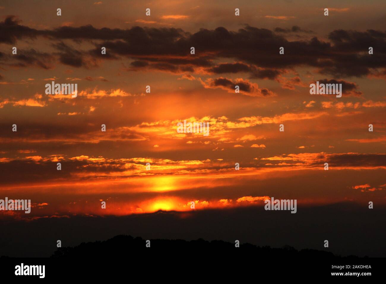 Sunset sky with clouds Stock Photo - Alamy