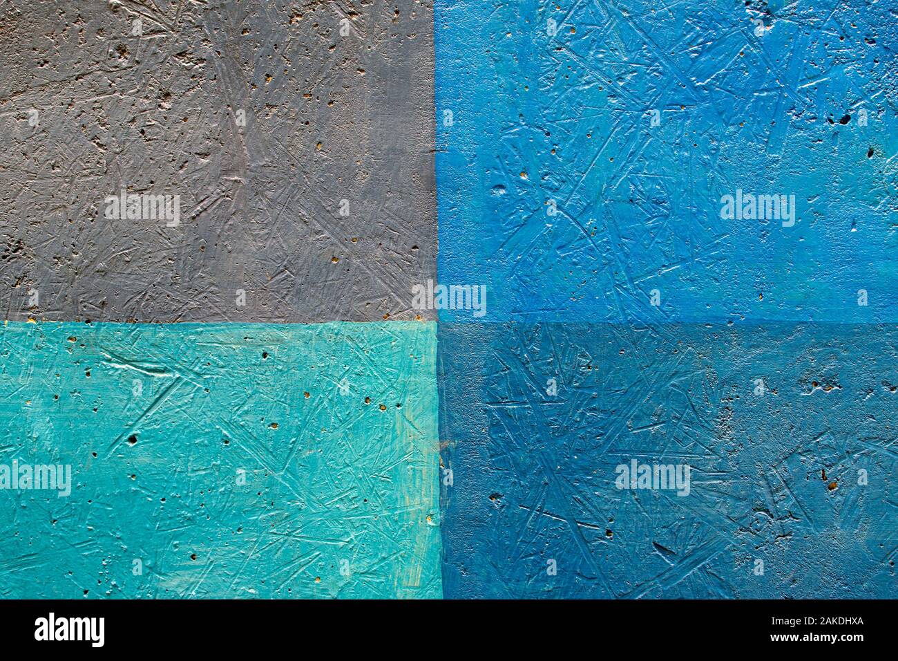 a wall texture that is painted in different colors, shades of blue ...