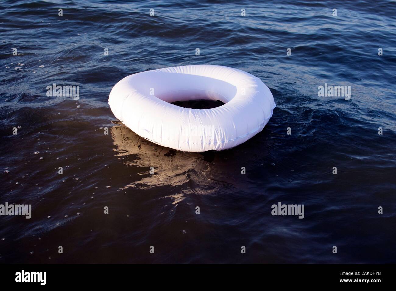 white flotation ring on blue sea, concept, safety on water, life saver ...