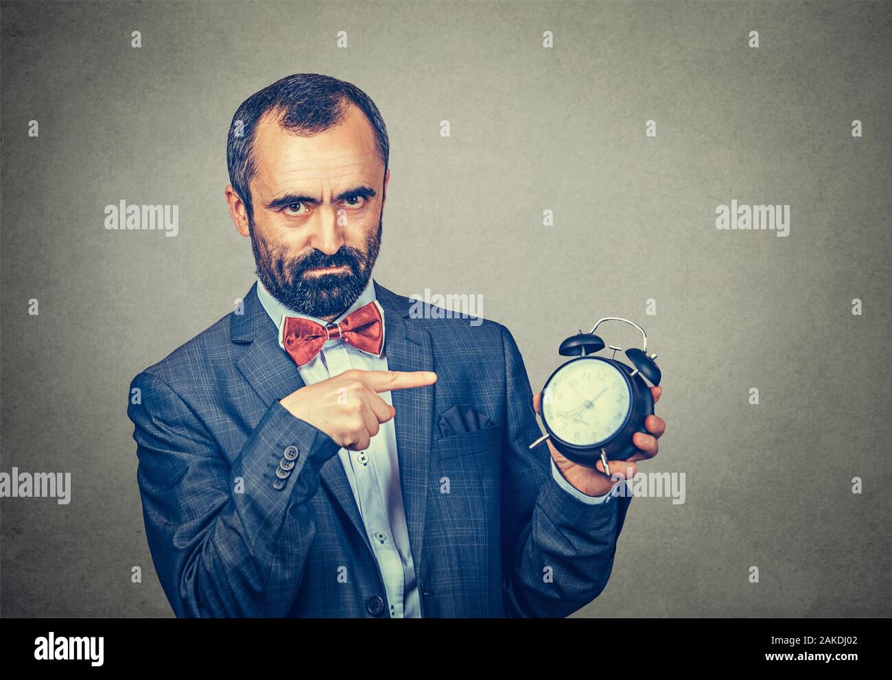 Angry man alarm clock in hi-res stock photography and images - Alamy