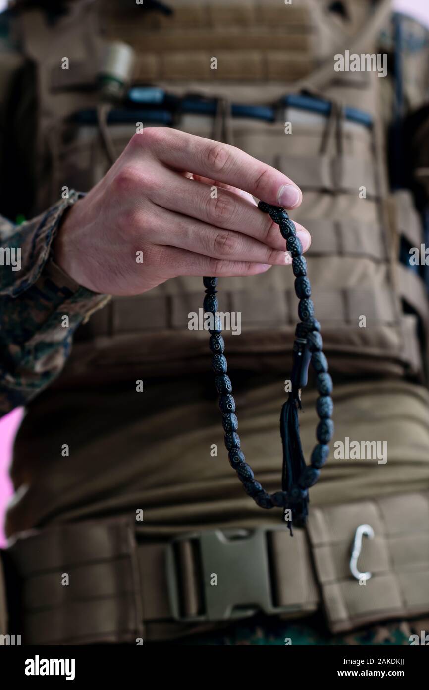 Muslim soldier praying hi-res stock photography and images - Alamy