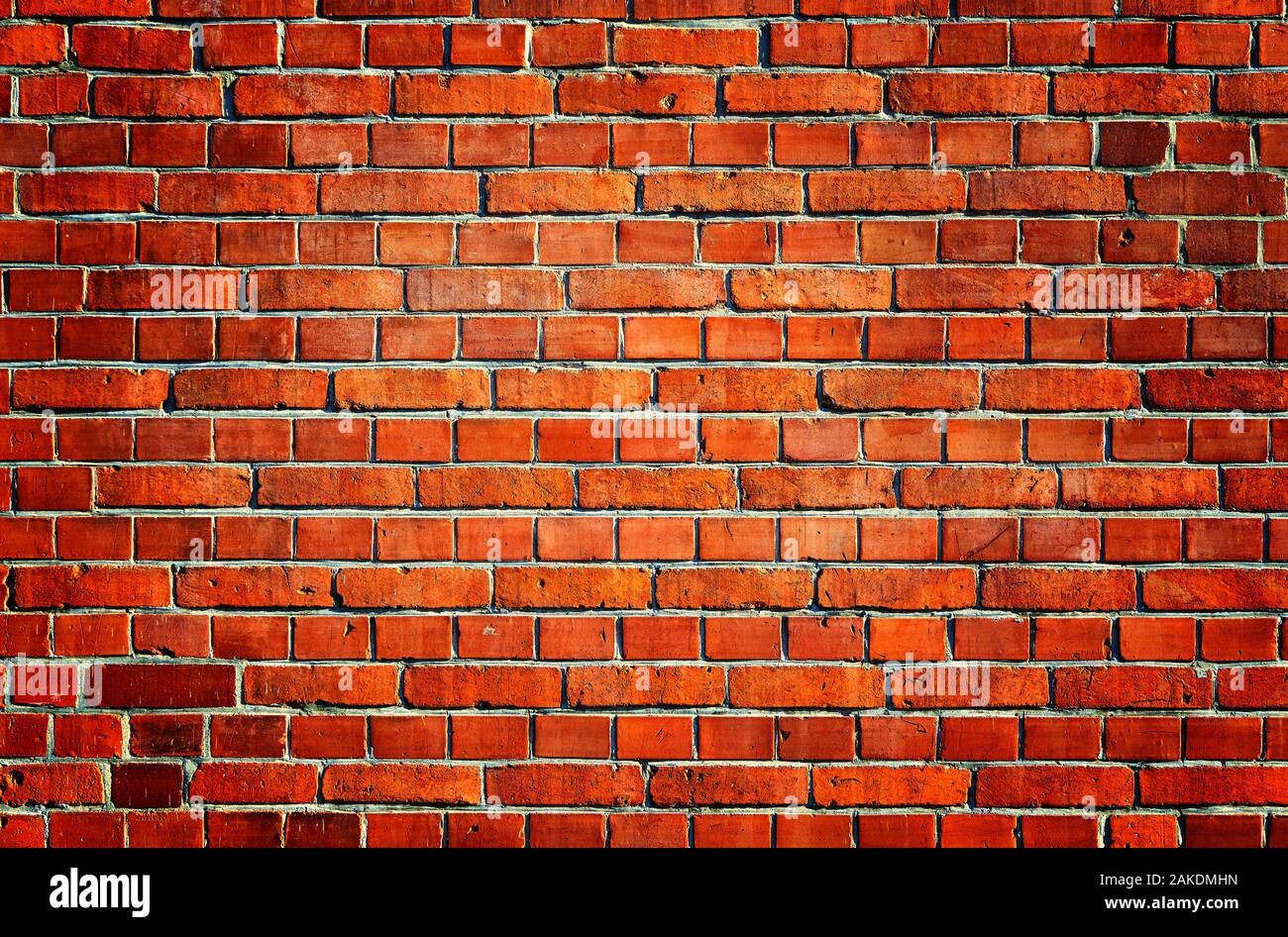 Spot light in the center of the red brick wall as a background Stock ...