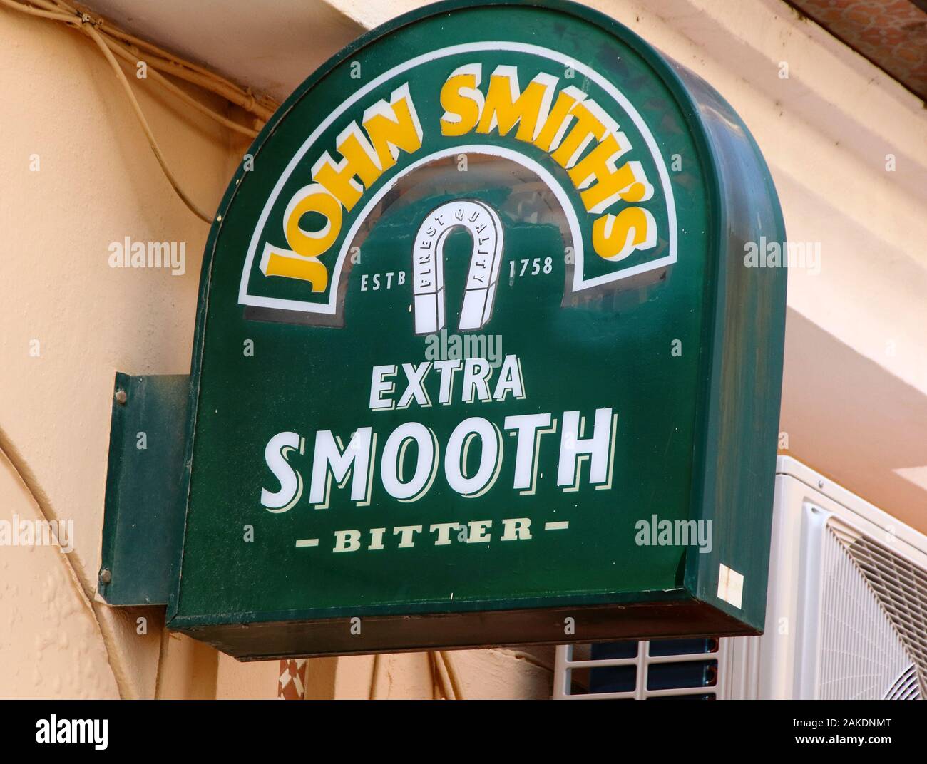 John Smiths Extra Smooth Bitter Beer sign seen outside a bar in Costa ...