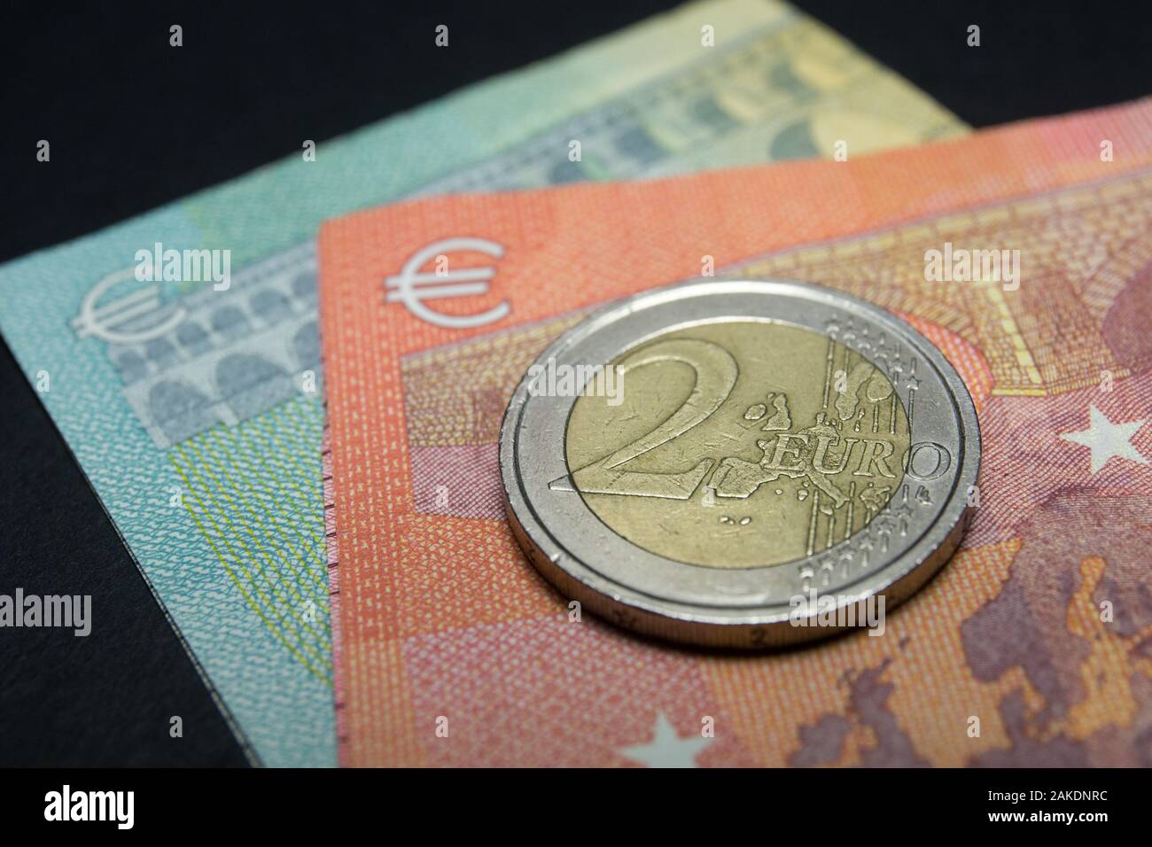 In this photo illustration a two euro coin seen displayed Stock Photo ...
