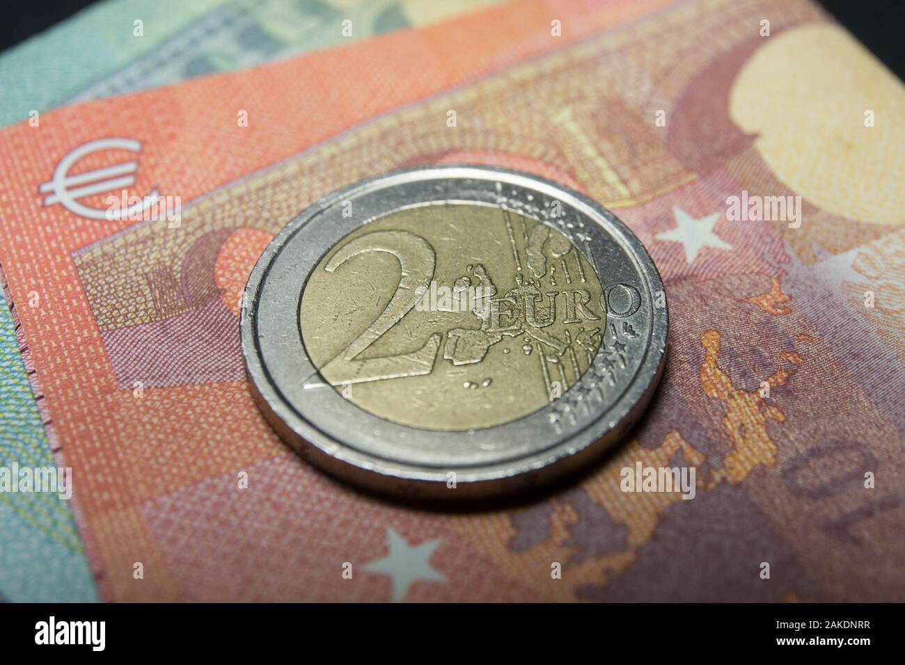 In this photo illustration a two euro coin seen displayed Stock Photo ...
