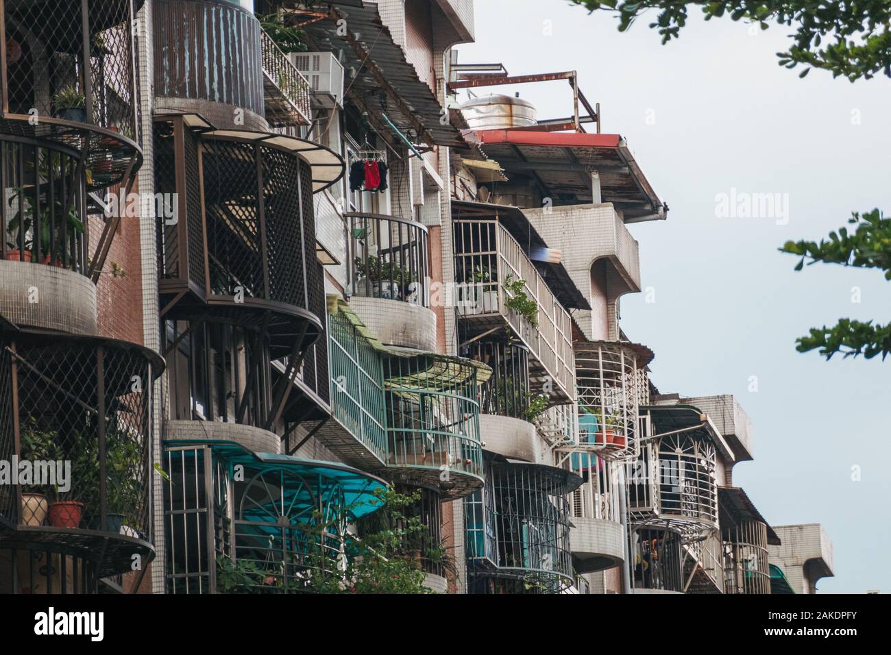 Various styles of caged balconies seen on the housing blocks of ...