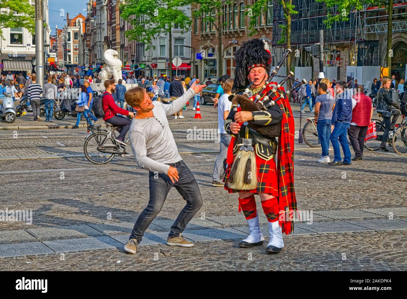 Amsterdam music artist at the Dam square Stock Photo - Alamy