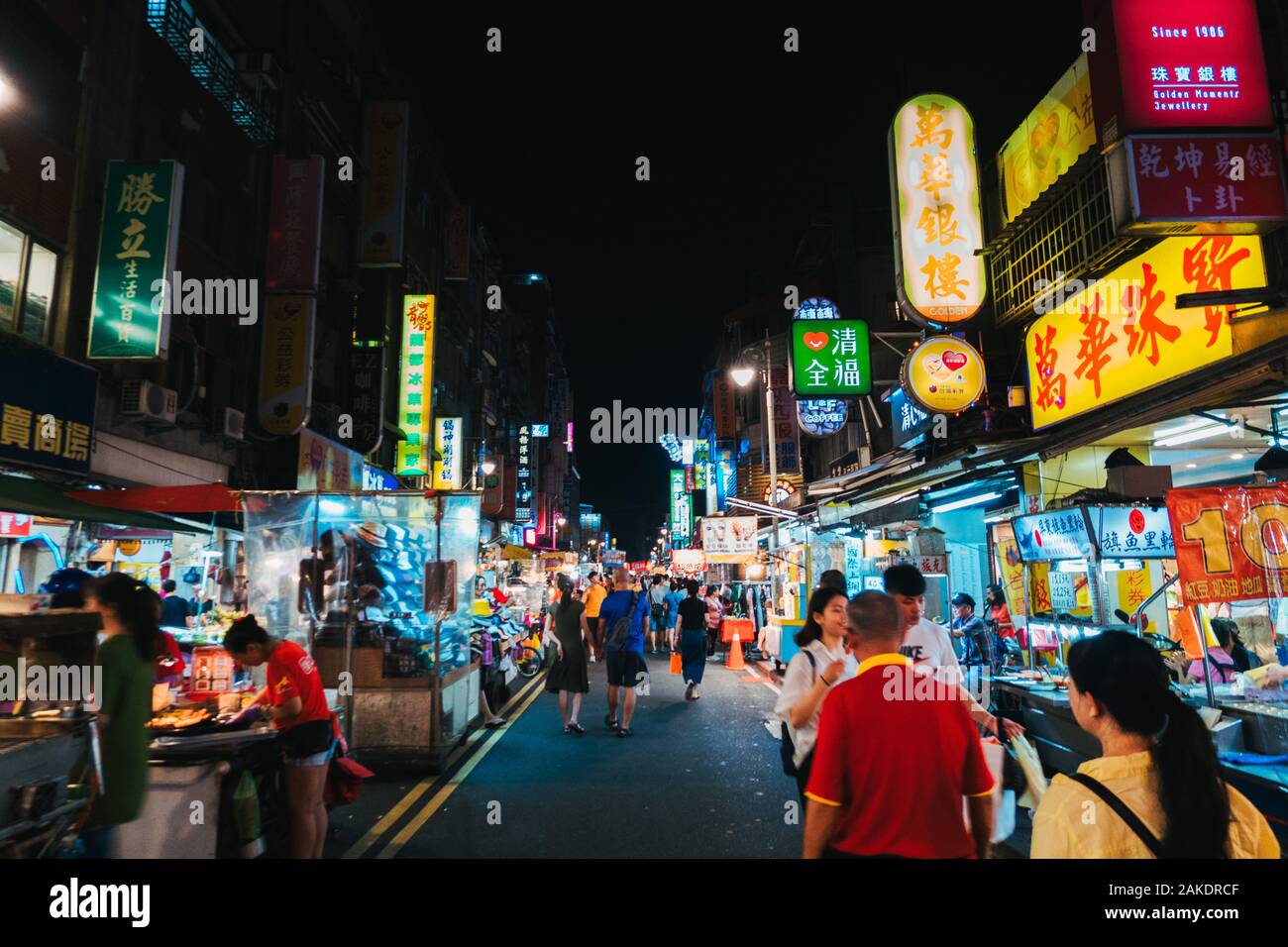 The Guangzhou Street Night Market alive at night in Taipei, Taiwan ...