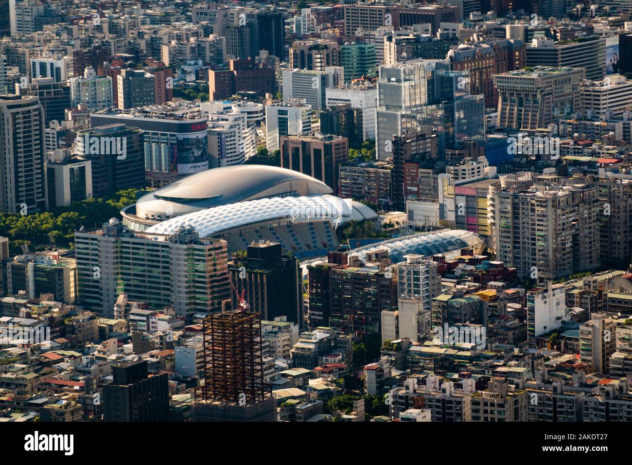 An aerial view of the Taipei Arena, nestled in between other high rises ...