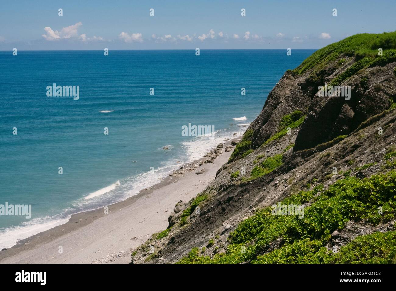 Blue waters and pebbled shore of Qixingtan Beach, near Hualien, on ...