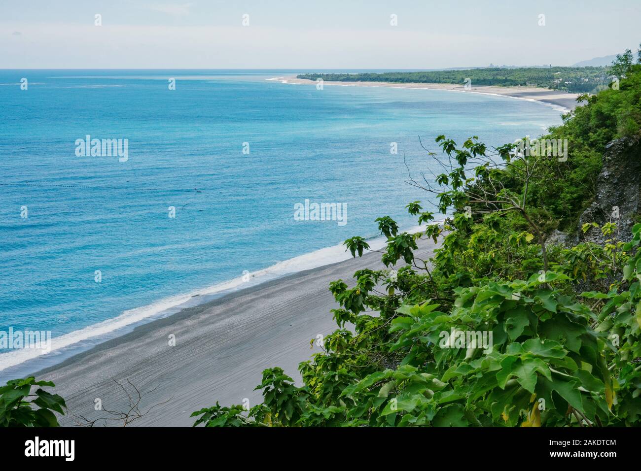 Blue waters and pebbled shore of Qixingtan Beach, near Hualien, on ...