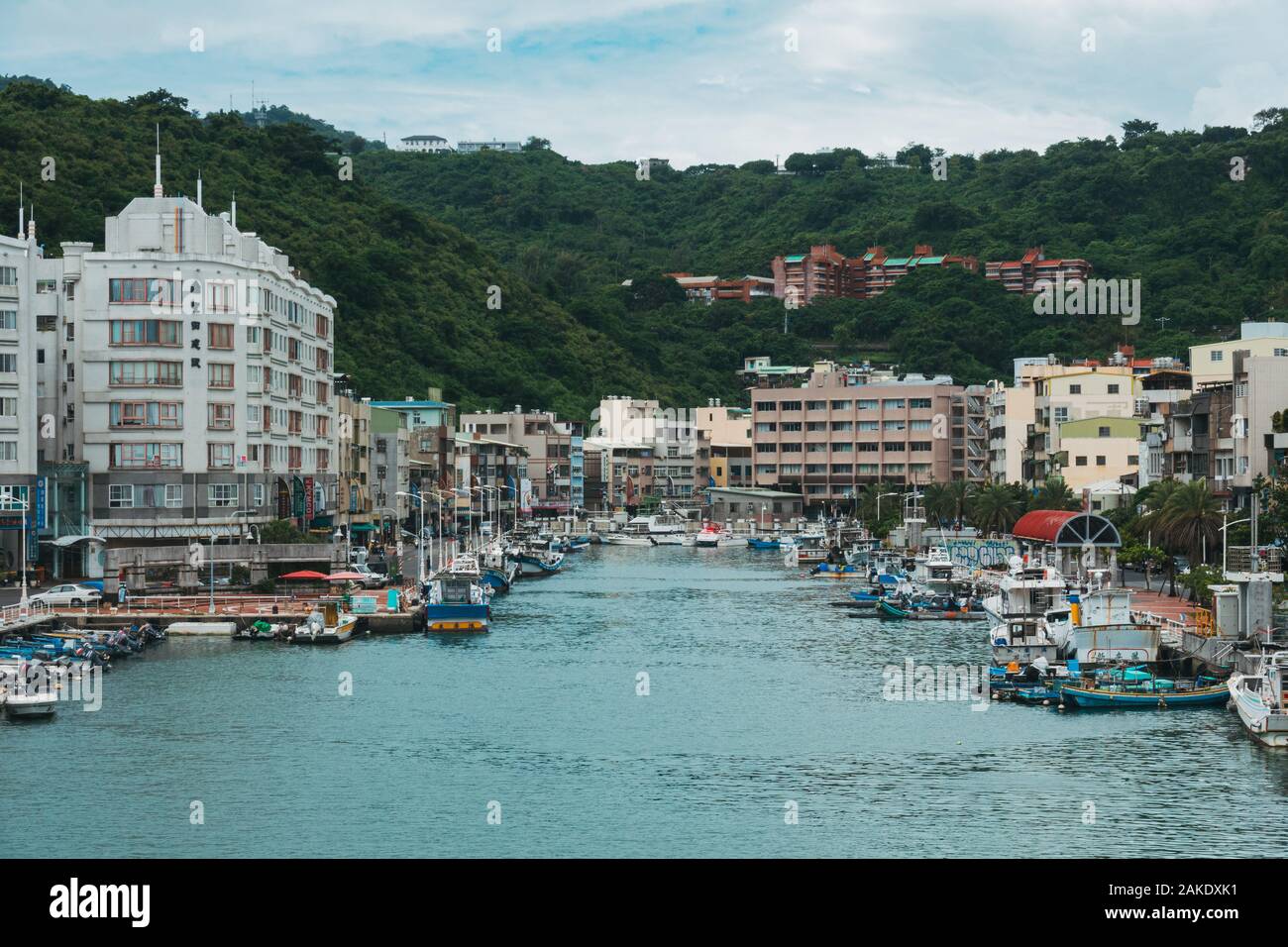 The Gushan Marina, filled with small boats, in Kaohsiung City, Taiwan ...