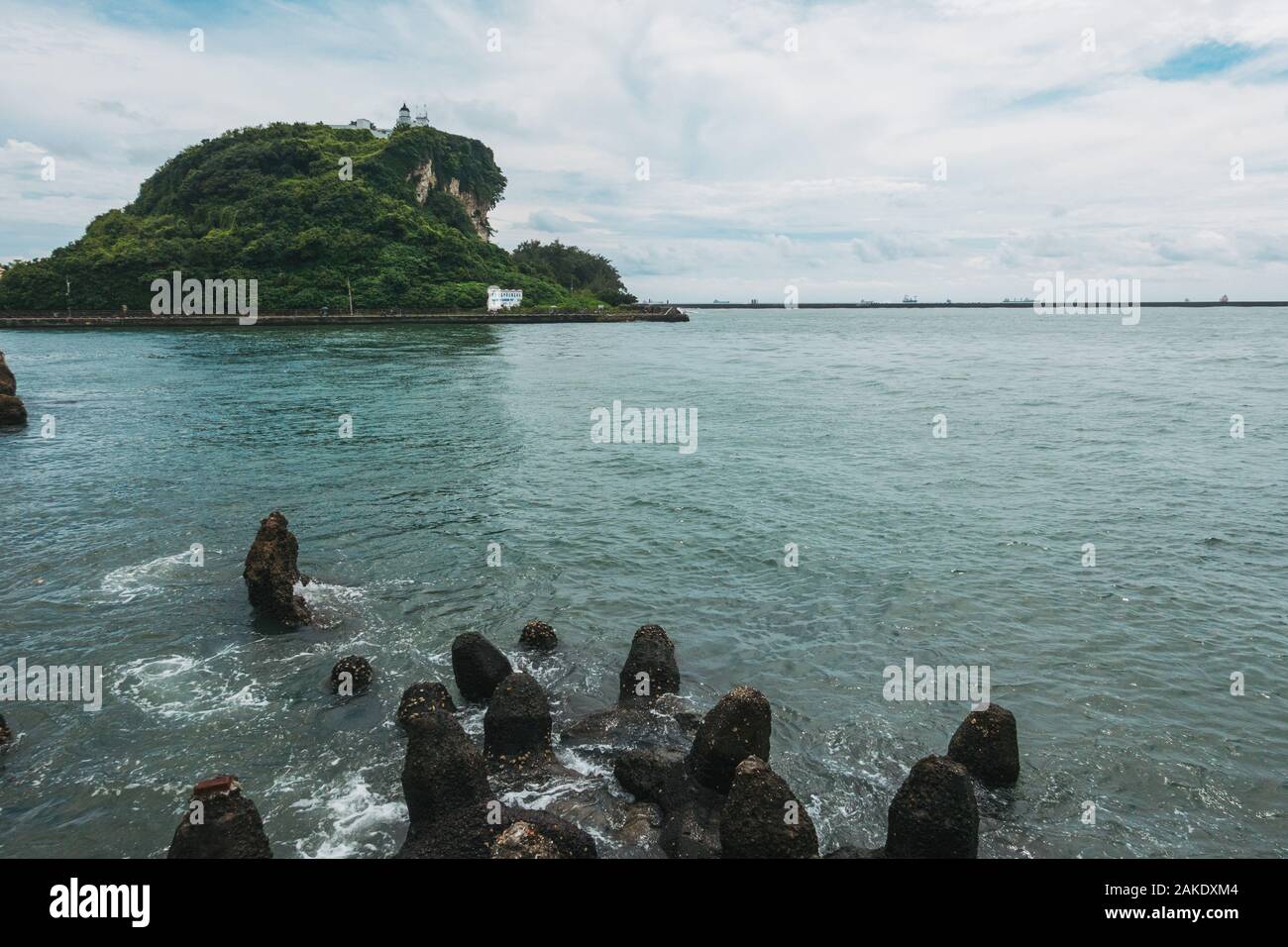 The Kaohsiung Lighthouse, atop the peninsula of Qijin Island, Kaohsiung ...