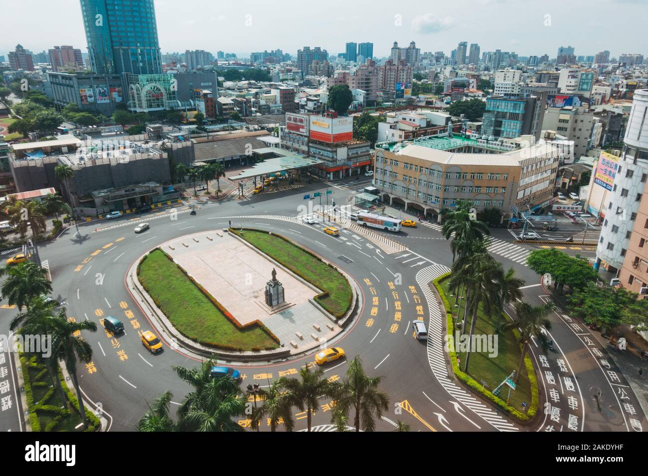Looking down on traffic as it goes around the roundabout in front of ...