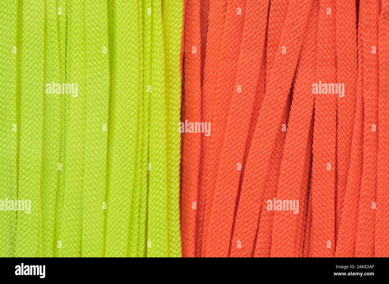 Orange and yellow shoelaces texture close-up Stock Photo - Alamy