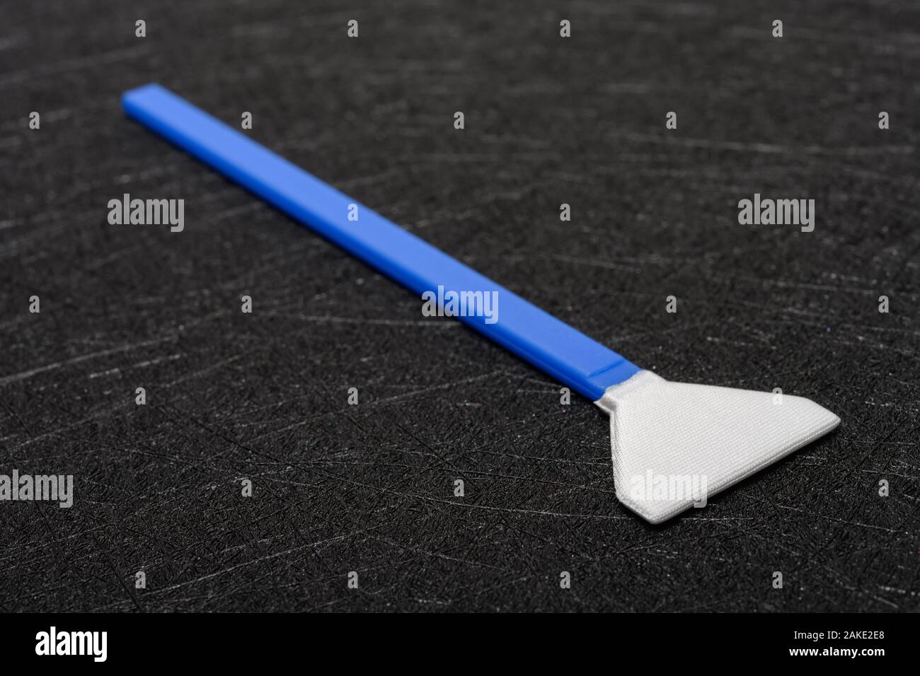 side view cmos cleaner on dark background Stock Photo - Alamy