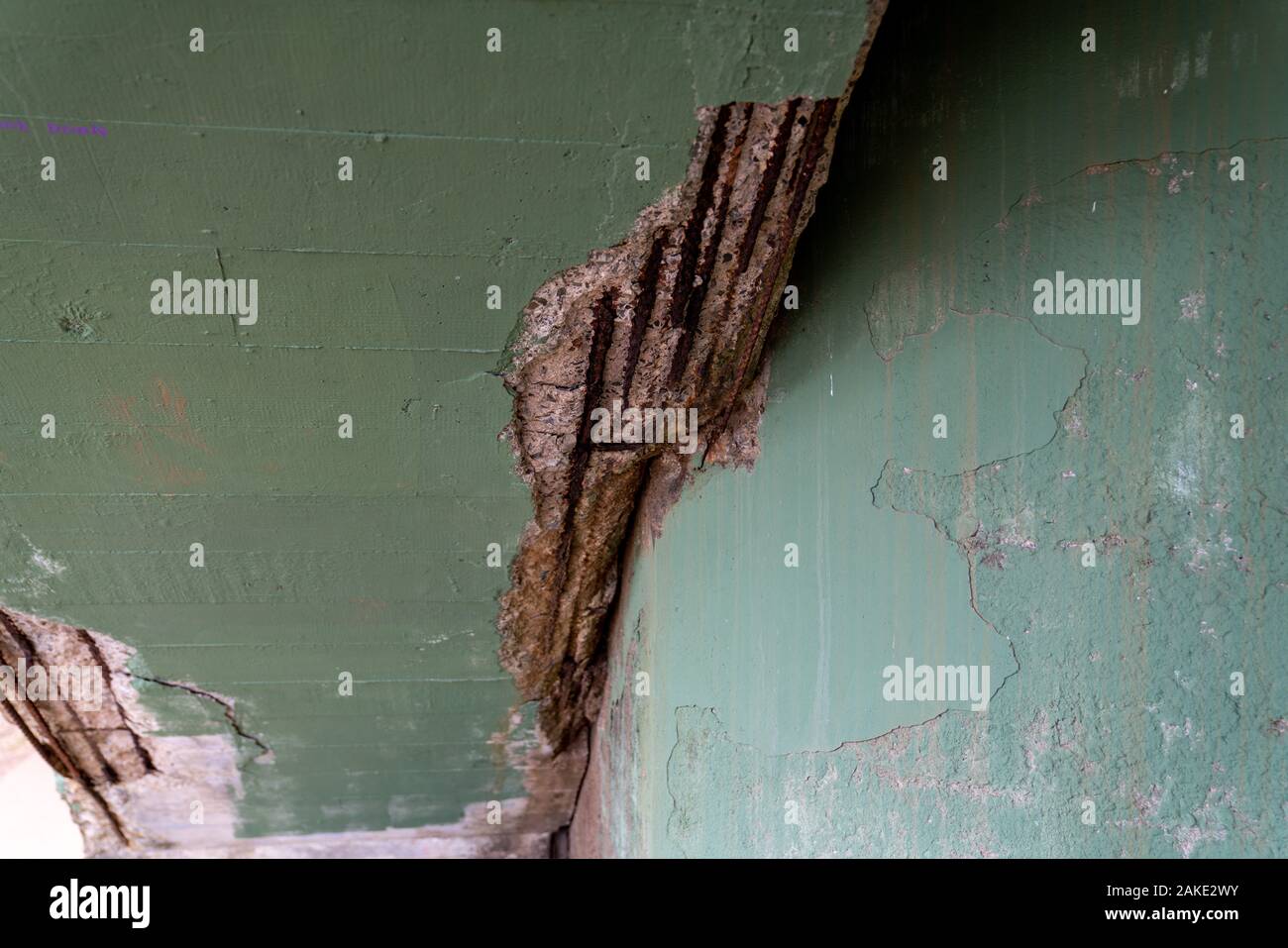 Broken concrete building structure with rebar foundation showing ...