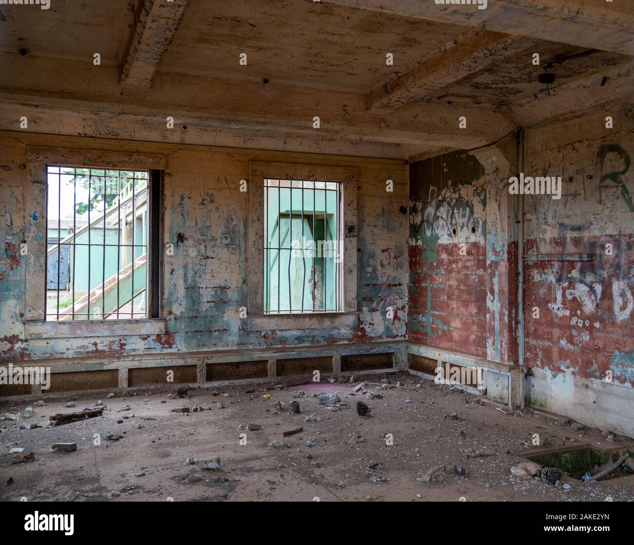 Abandoned prison jail building complex with graffiti and broken ...
