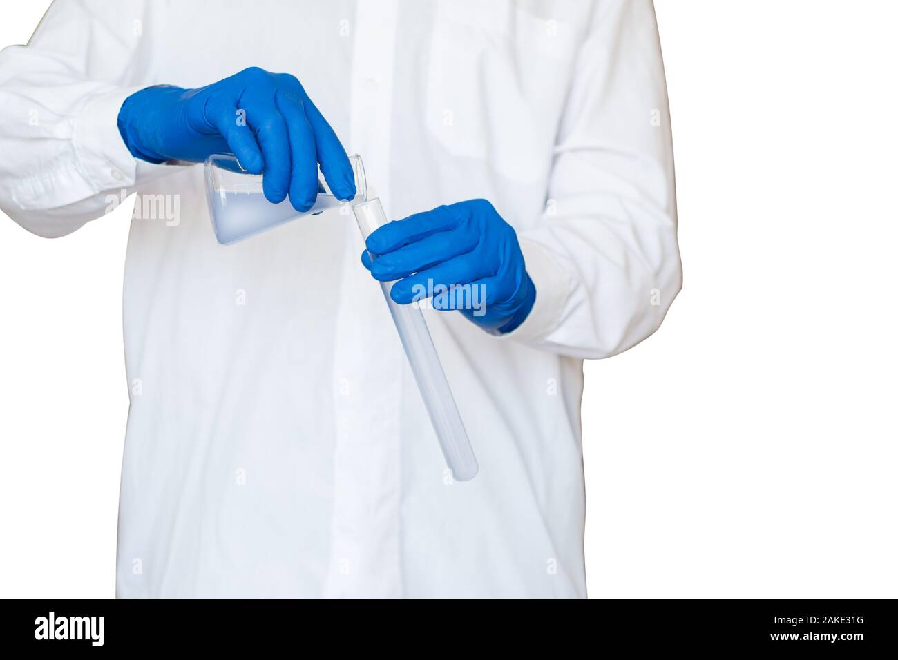 Male scientists mixing reagents in lab conditions Stock Photo - Alamy