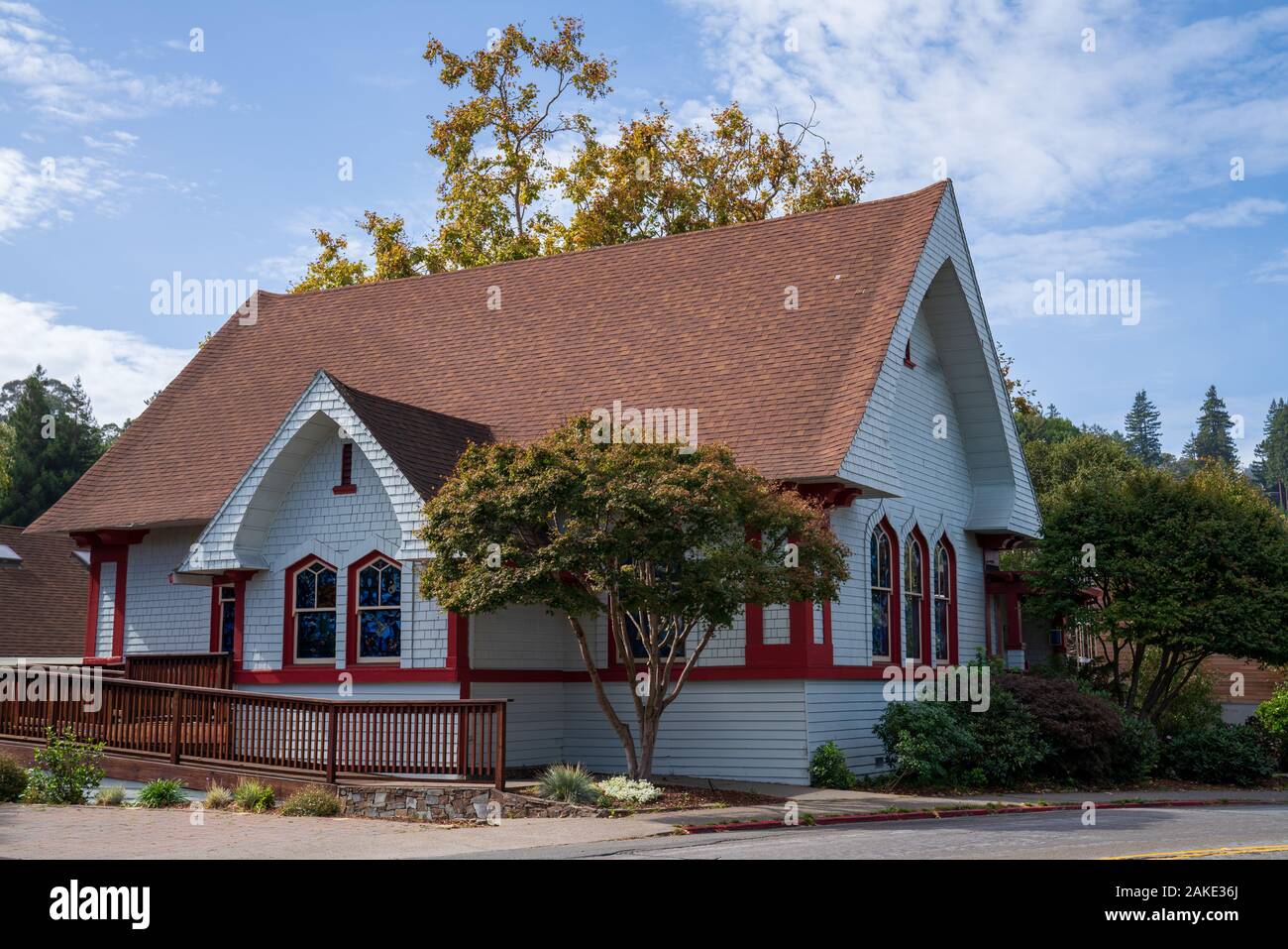 Quaint church building chapel next to street on sunny day Stock Photo ...
