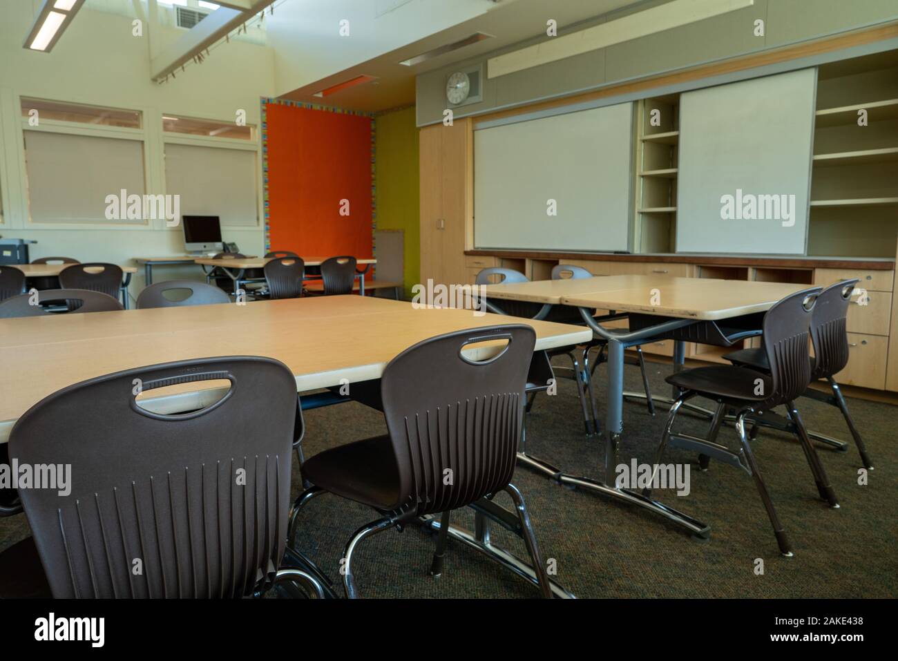 Empty grade school classroom with Apple Mac computer in back Stock ...