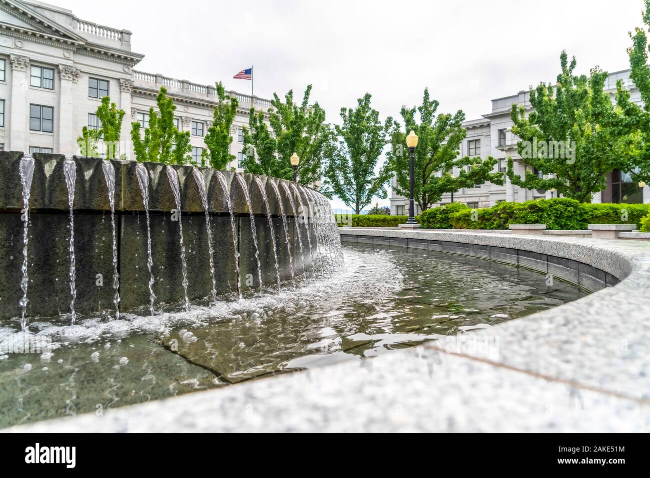 Circular water fountain with Utah State Capital Building in Salt Lake ...