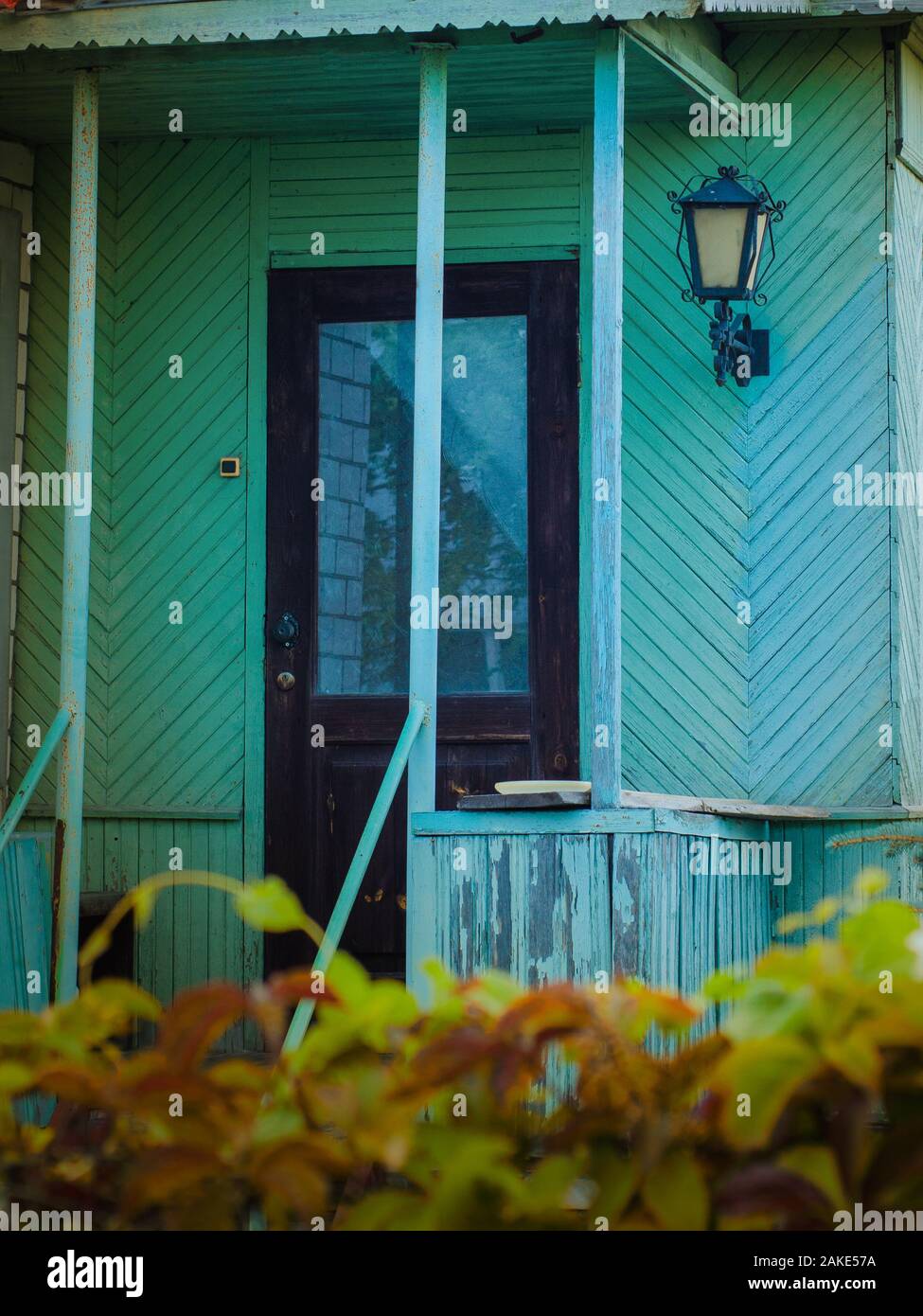 facade of the old cyan wooden house Stock Photo - Alamy