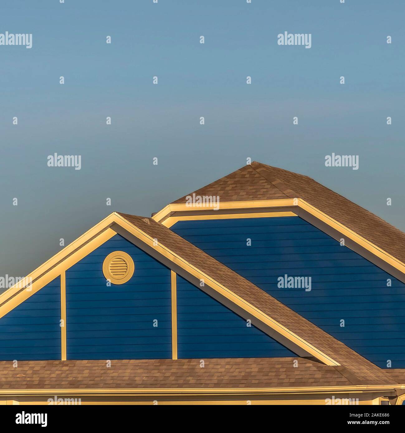 Square frame Close up of roof structure of home with blue gable wall ...