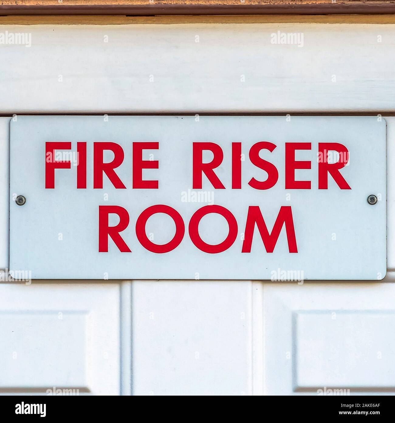 Square Close up of the Fire Riser Room with white wooden door of a ...