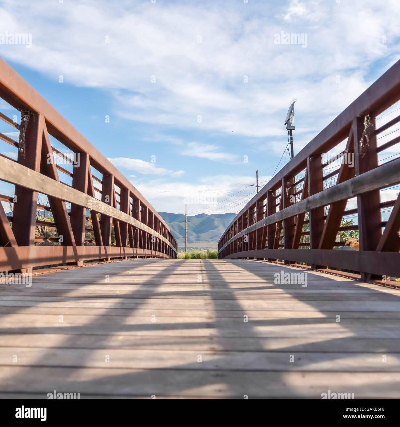 Square frame Focus on bridge with brown lattice metal railing and ...