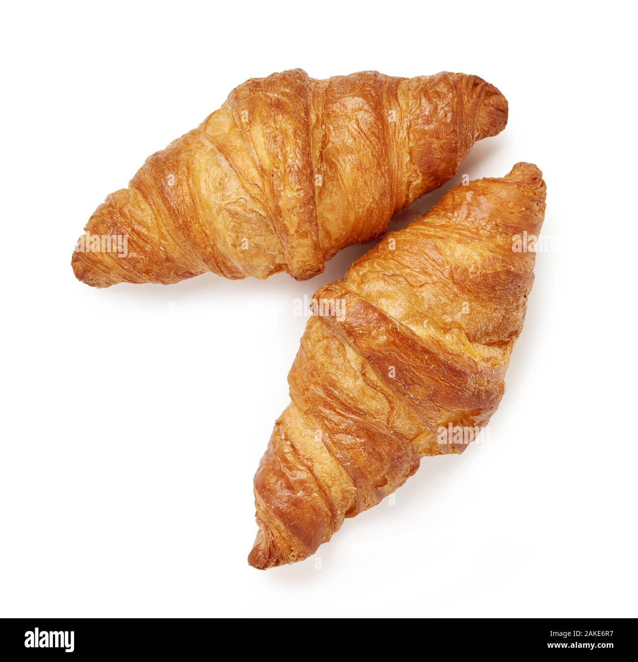 Two croissants isolated on white background. Top view Stock Photo - Alamy