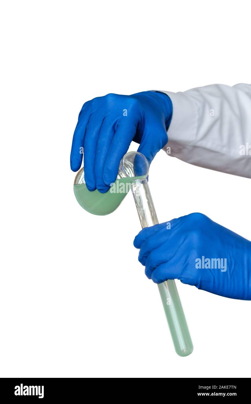 Male scientists mixing reagents in lab conditions Stock Photo - Alamy