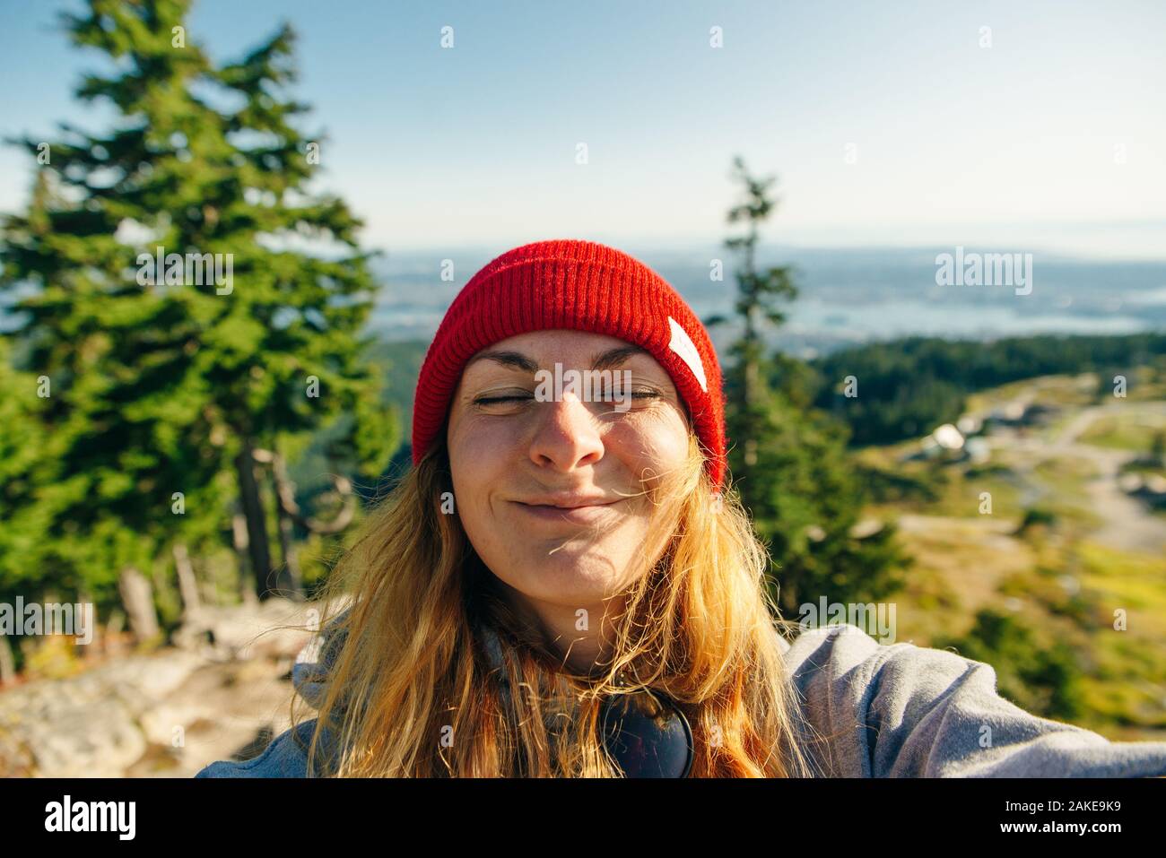 tourist on Grouse Mountain with Downtown city. North Vancouver, BC ...