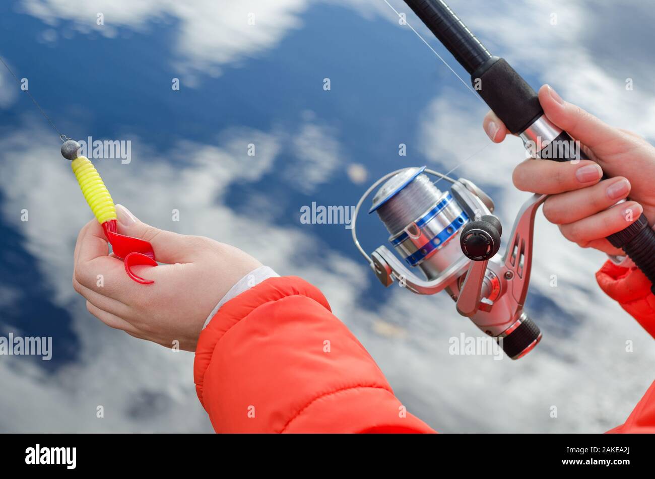 Girl holding fishing pole hi-res stock photography and images - Alamy