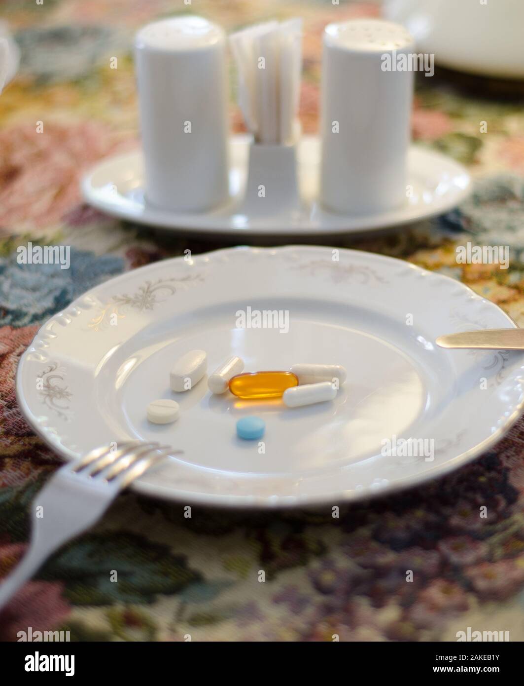 Eating drugs, tablets and pills. Closeup photo Stock Photo - Alamy