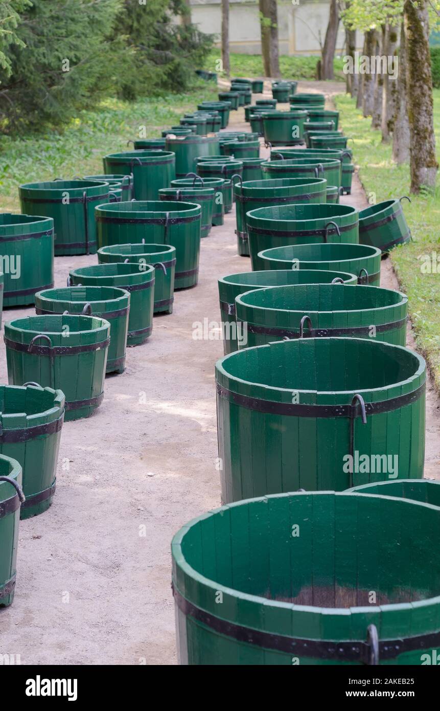 Many green wooden barrels in the Park Stock Photo - Alamy