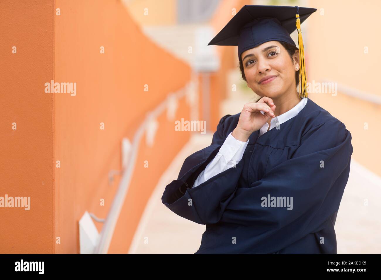 Young hispanic female graduate at her graduation Stock Photo - Alamy
