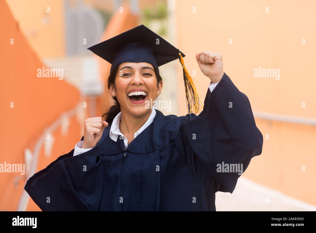 Young hispanic female graduate at her graduation Stock Photo - Alamy