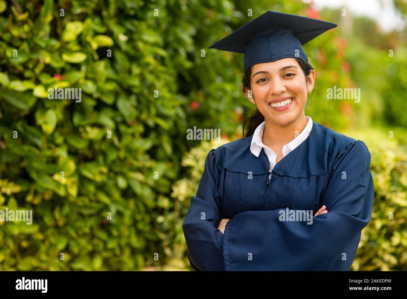 Young hispanic female graduate at her graduation Stock Photo - Alamy