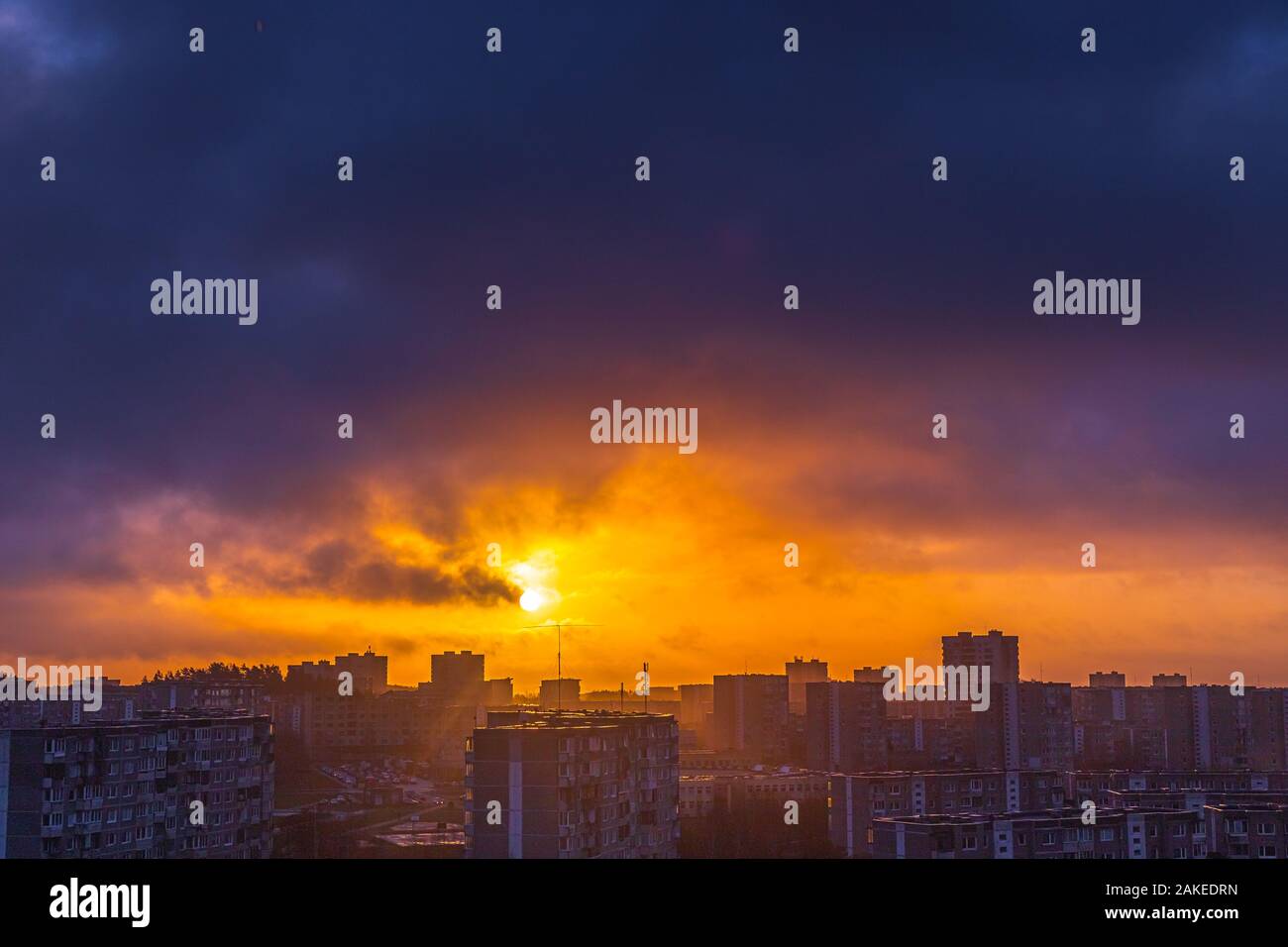 Morning sunrise over the city residential houses Stock Photo - Alamy