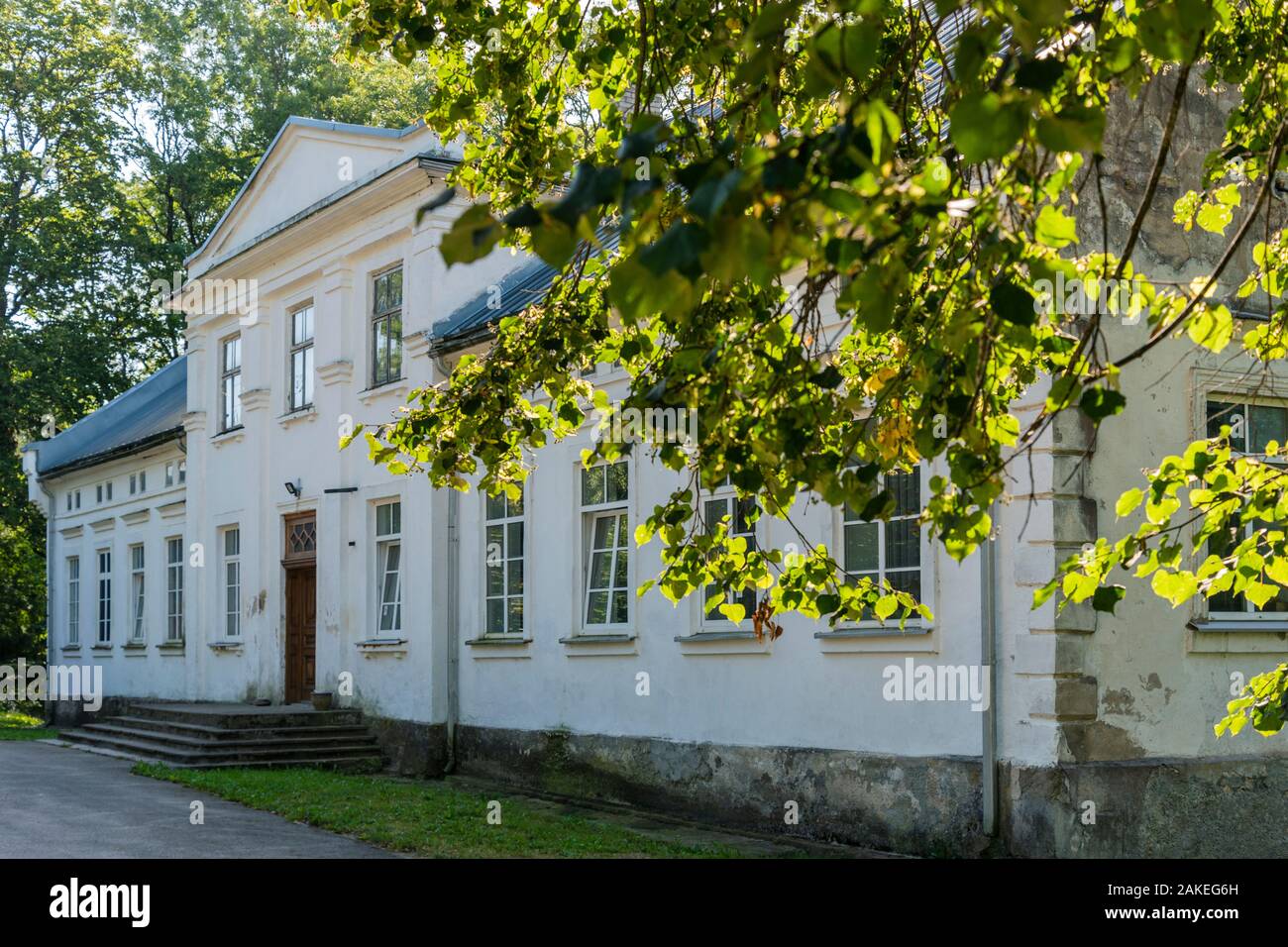 Exterior of old manor house with new blue roof Stock Photo - Alamy