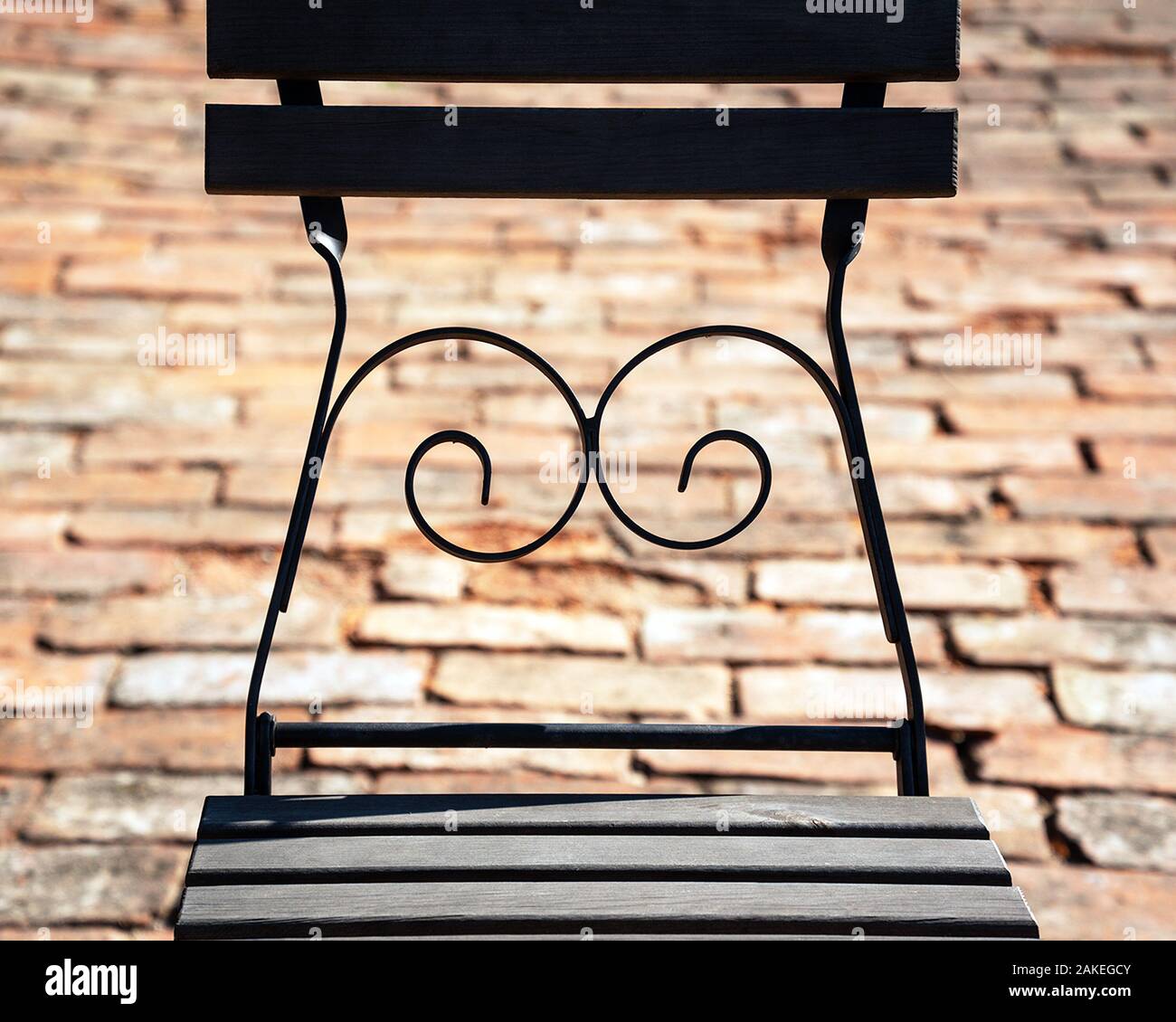 Lightweight chair on brick surface of floor Stock Photo - Alamy