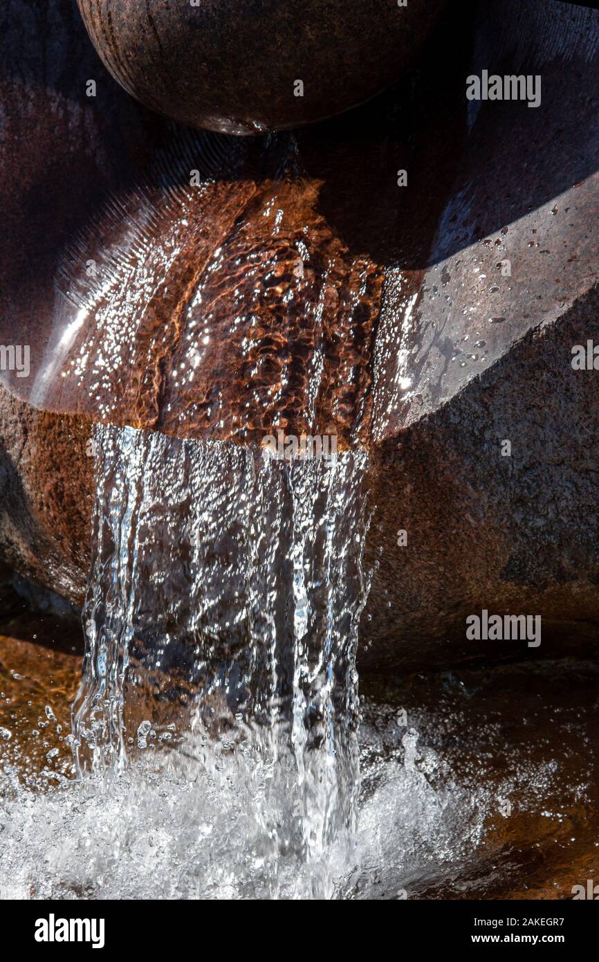 Waterfall of natural source in stone surface Stock Photo - Alamy