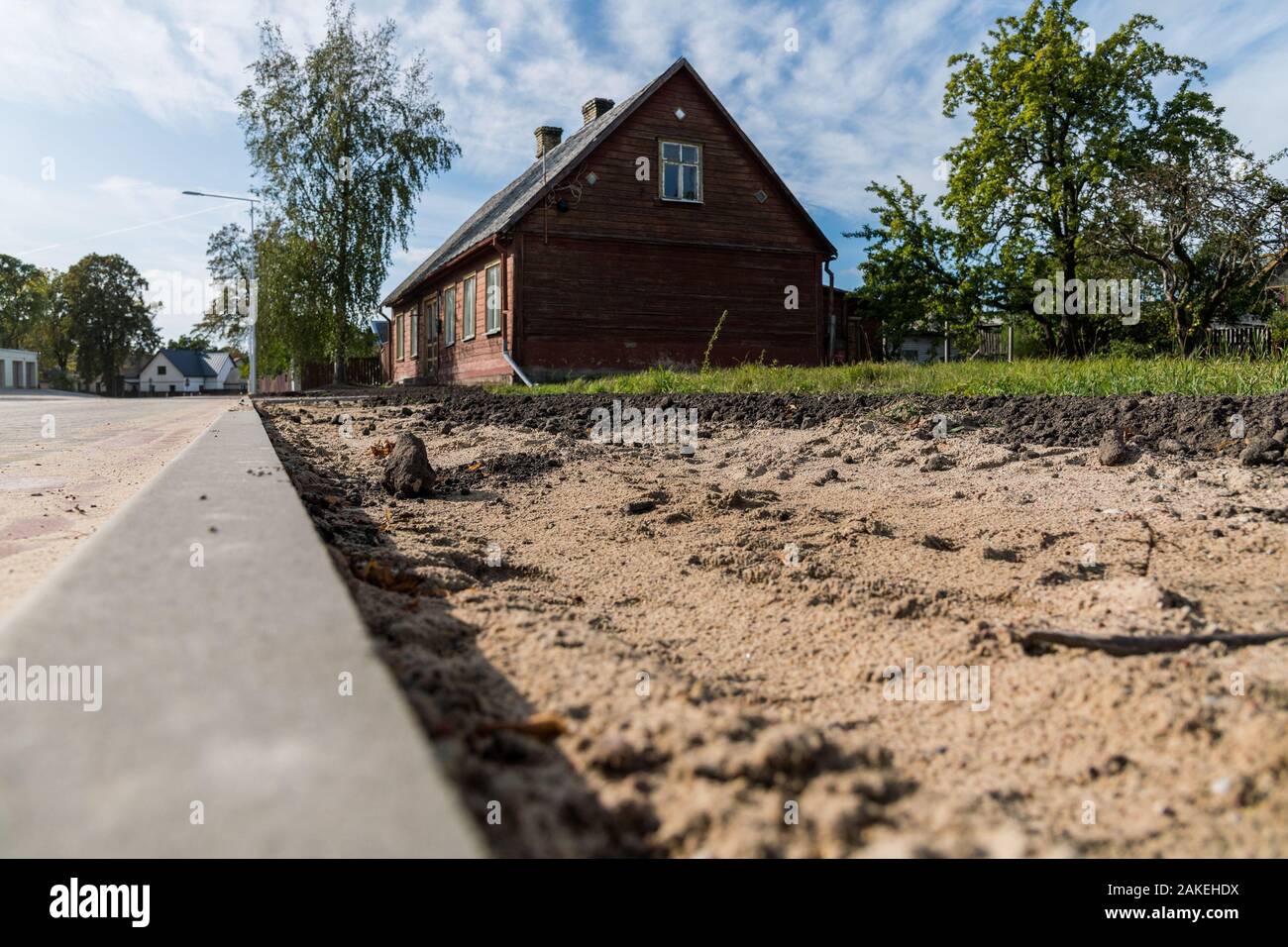 Road construction in small city Stock Photo - Alamy