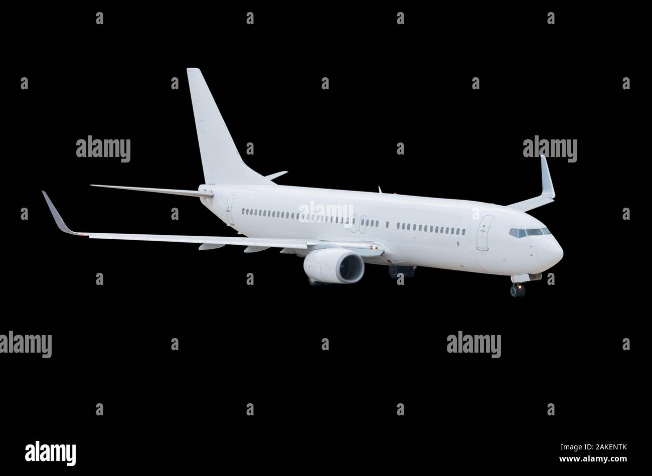 Airplane isolated on black background Stock Photo - Alamy