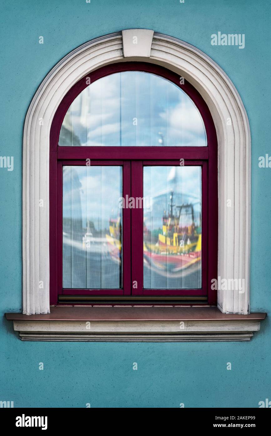 View to one beautiful window with reflection of ship Stock Photo - Alamy