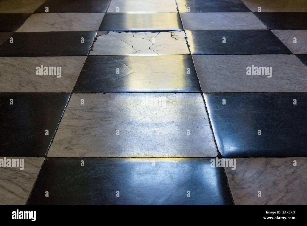 Block of antique tiles floor in manor house Stock Photo - Alamy