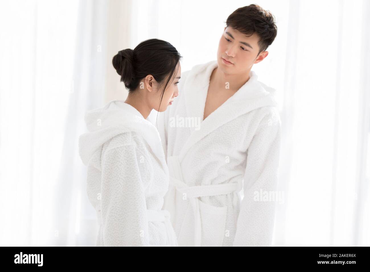 Young Chinese couple arguing in living room Stock Photo - Alamy