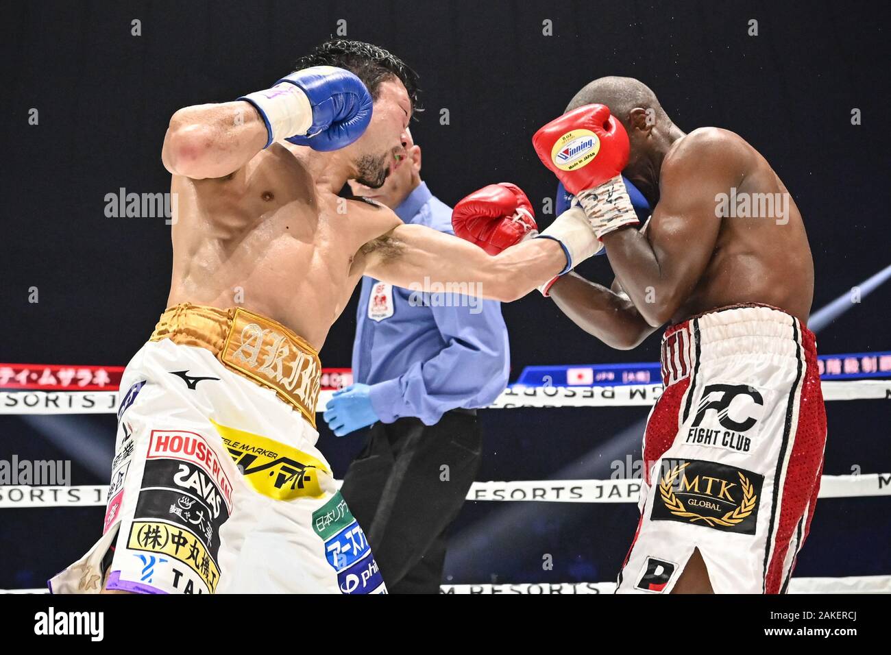 Japan's Akira Yaegashi (L) and South Africa's Moruti Mthalane fight at ...